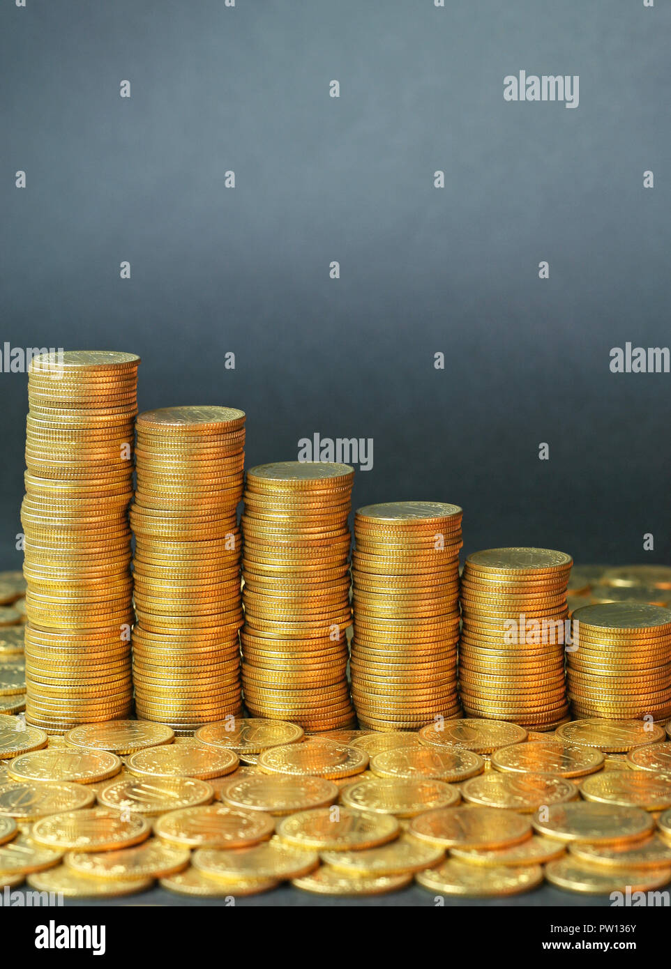 Austerity coins chart of down Economy crisis Stock Photo - Alamy