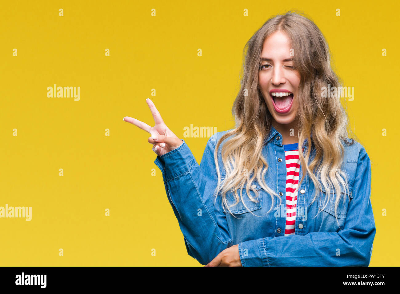 Hispanic beautiful woman winking face hi-res stock photography and ...