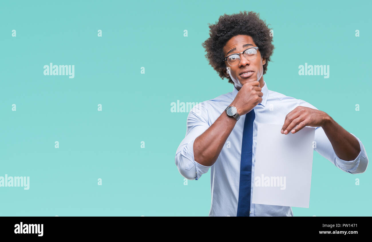 Afro american man holding blank paper contract over isolated background ...