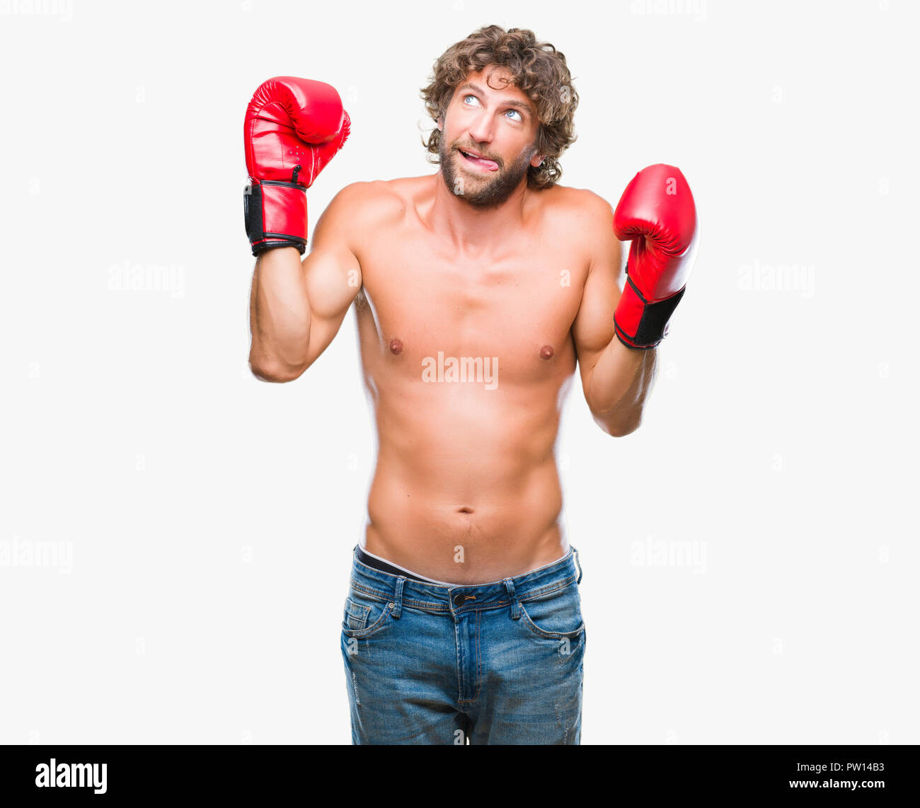 Handsome hispanic boxer man wearing boxing gloves over isolated ...