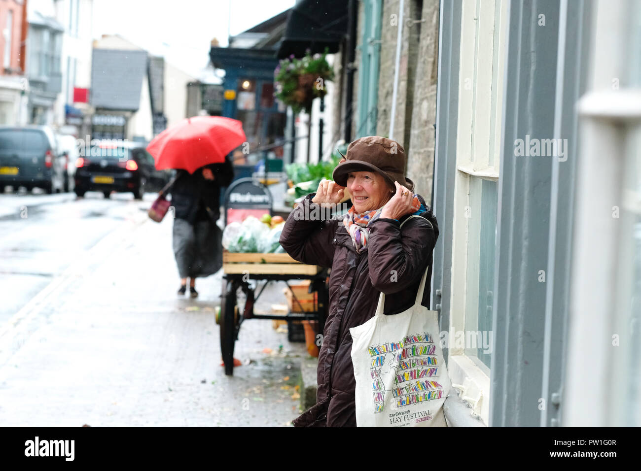 Windy weather hat hi-res stock photography and images - Alamy