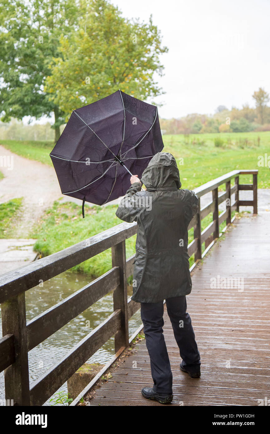 Lady Walking In Rain With Umbrella Stock Photos & Lady Walking In Rain ...