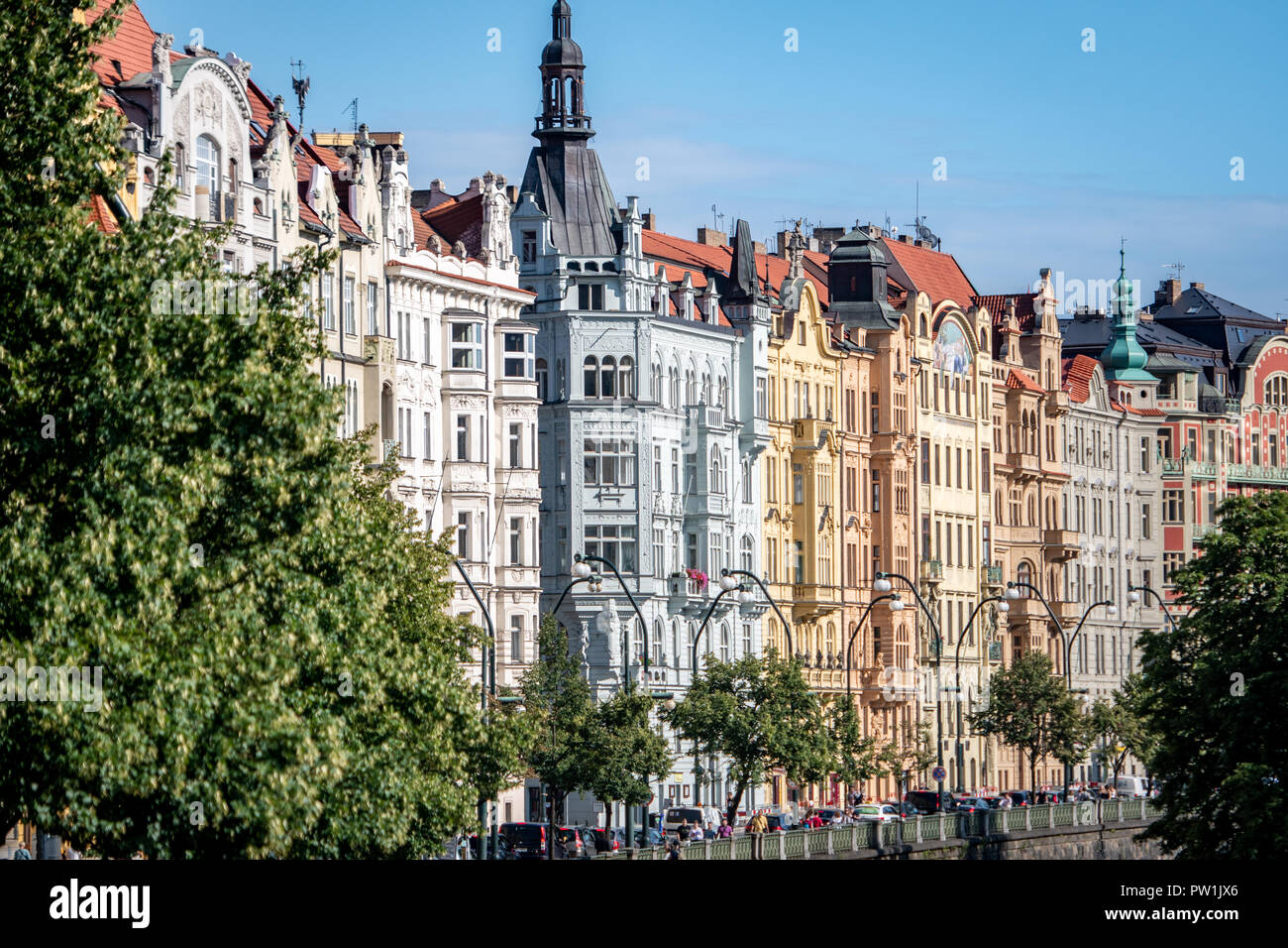 Side view of colorful buildings with street below in Prague - Czech ...
