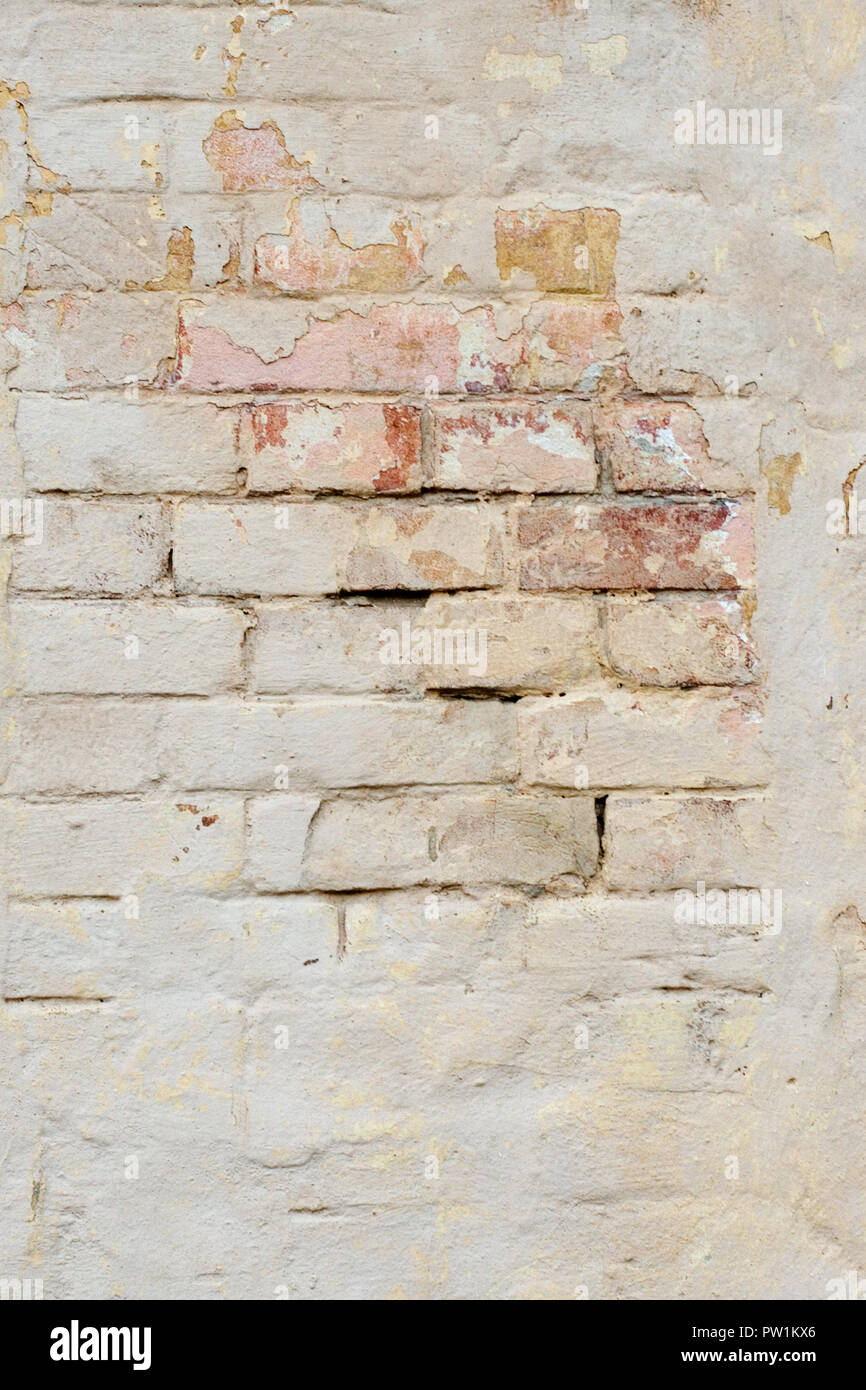 old crumbled clay brick wall background Stock Photo - Alamy