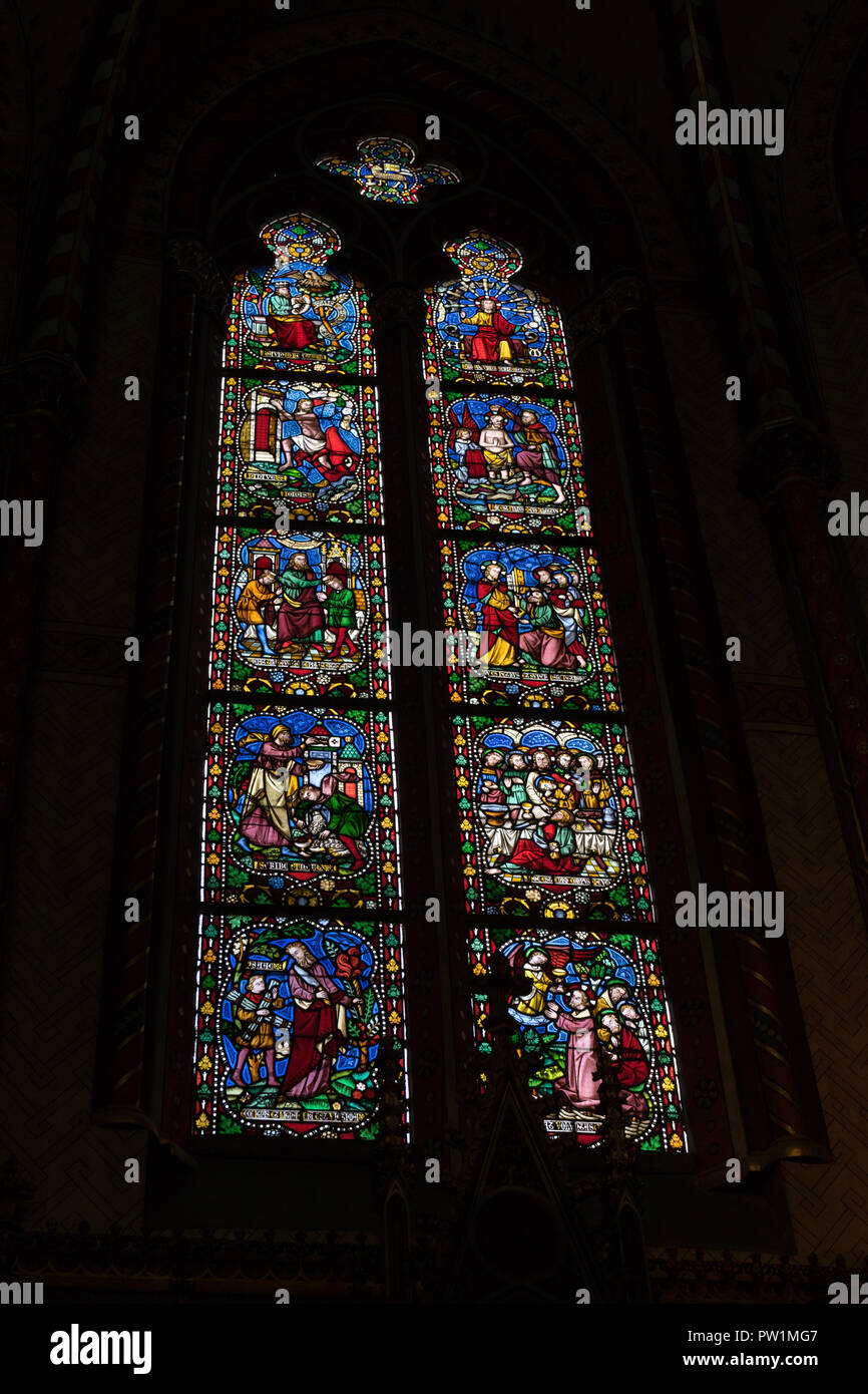 A large french window with design pattern allowing light to pass ...