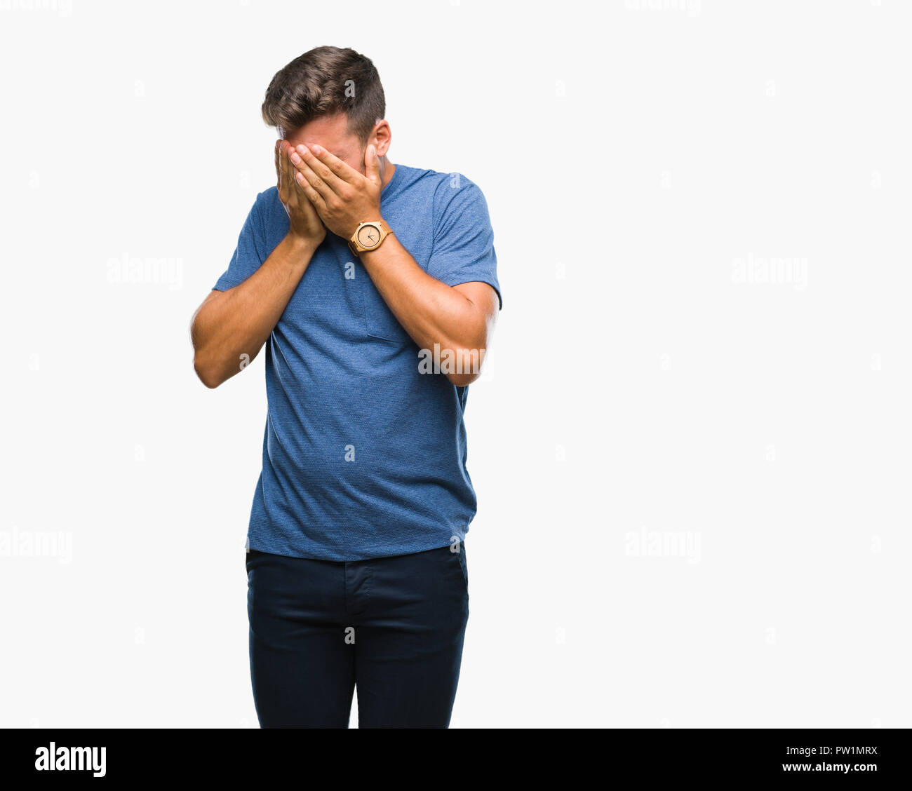 Young handsome man over isolated background with sad expression ...