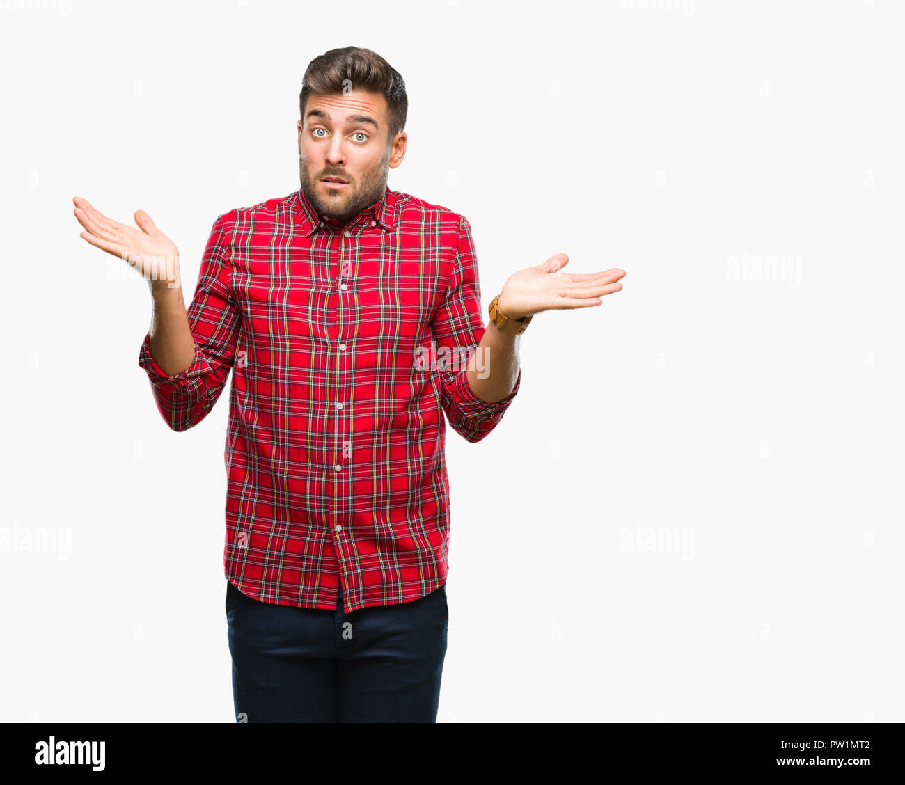 Young handsome man over isolated background clueless and confused ...