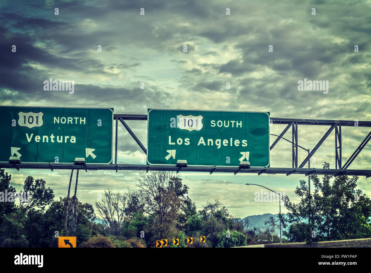 Los Angeles exit sign in 101 freeway under an overcast sky, California ...