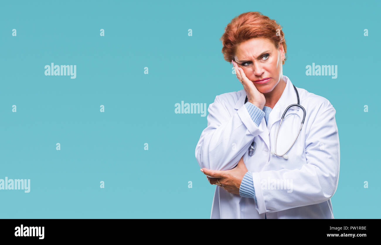 Senior caucasian doctor woman wearing medical uniform over isolated ...