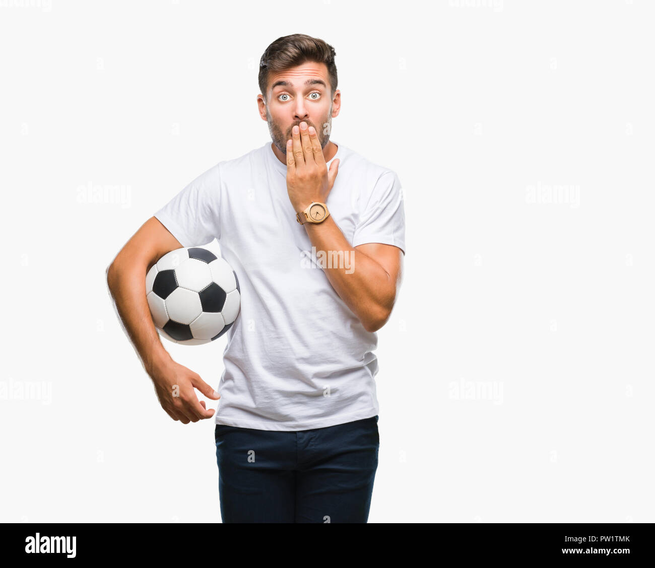 Young handsome man holding soccer football ball over isolated ...