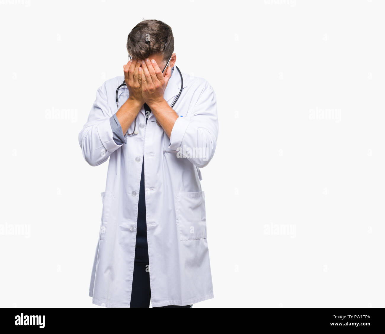 Young handsome doctor man over isolated background with sad expression ...