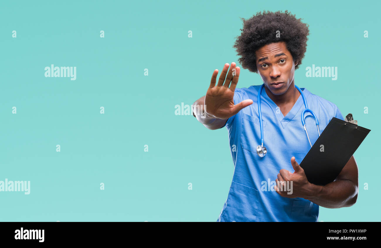 Afro american surgeon doctor holding clipboard man over isolated ...