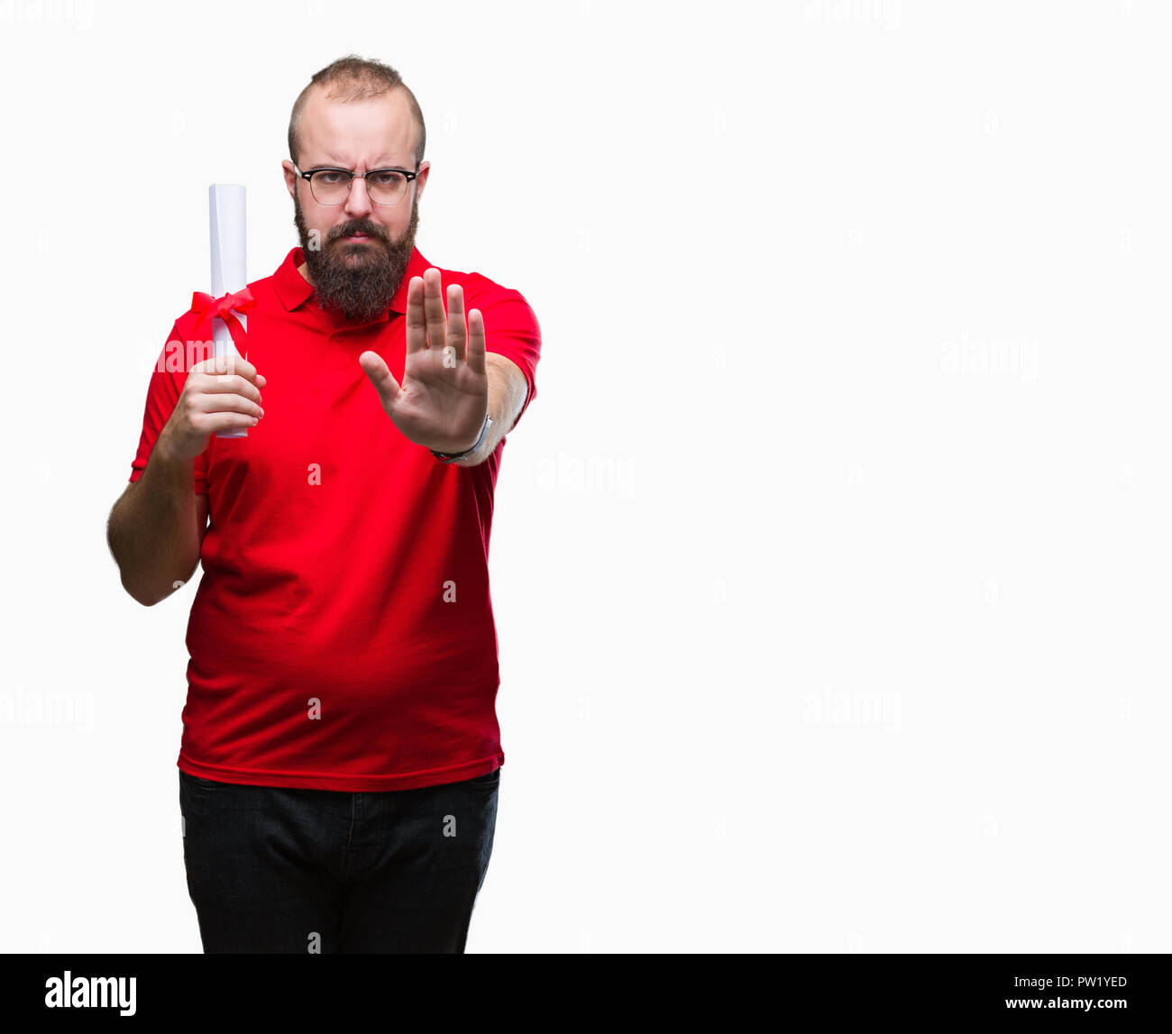 Young hipster man wearing glasses and holding degree over isolated ...