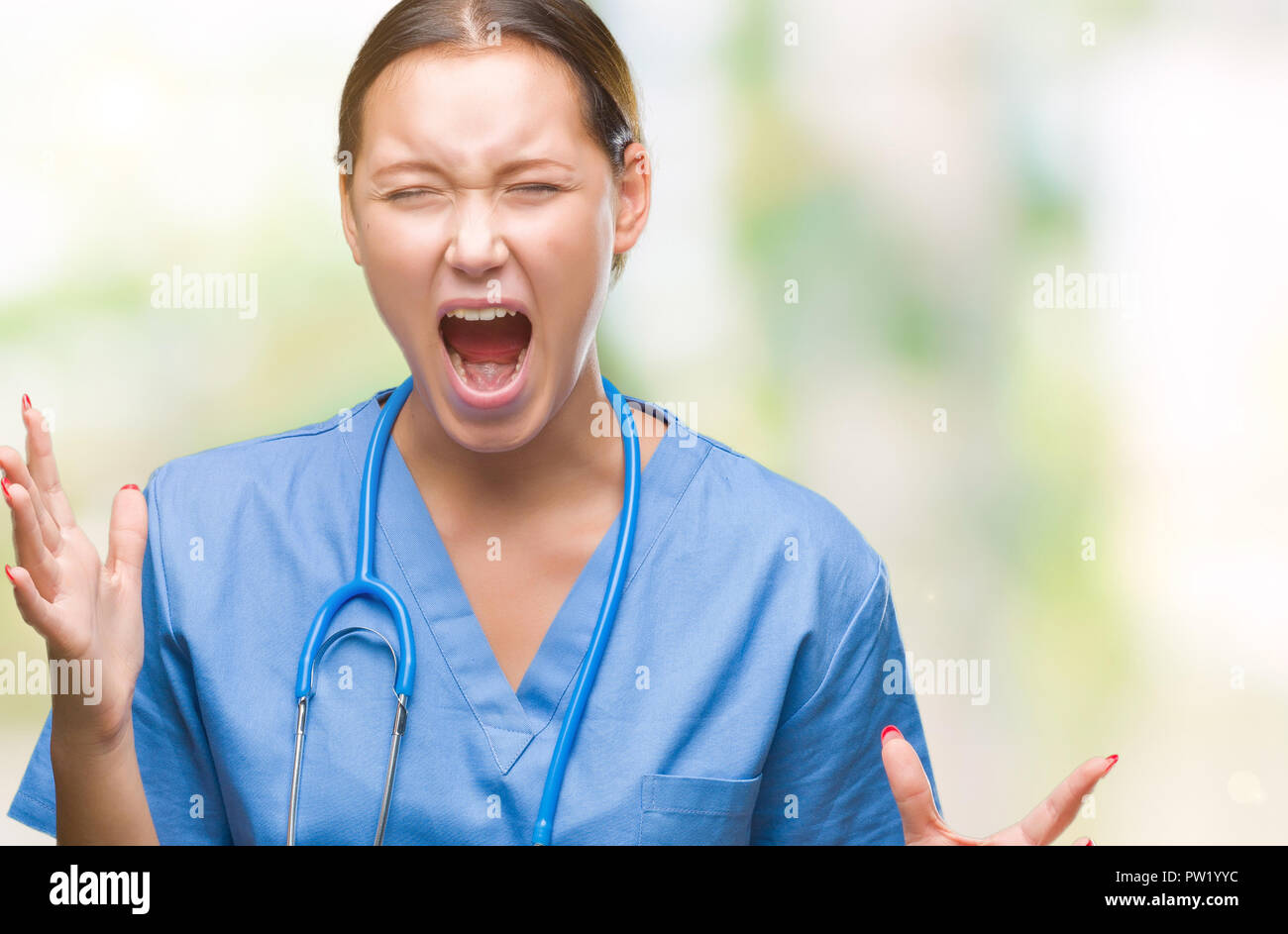 Young caucasian doctor woman wearing medical uniform over isolated ...
