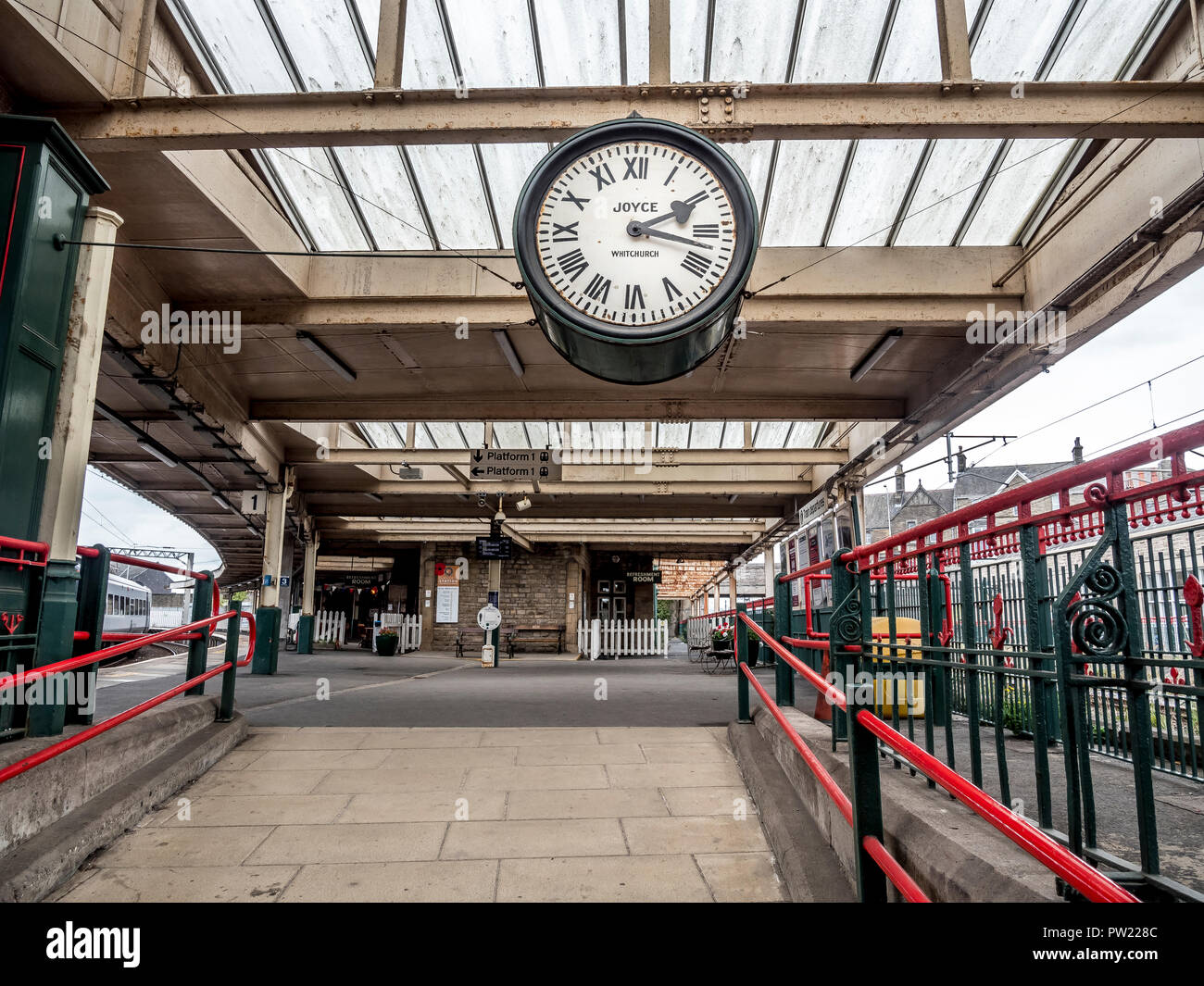 The station clock at Carnforth Railway Station in northern Lancashire ...