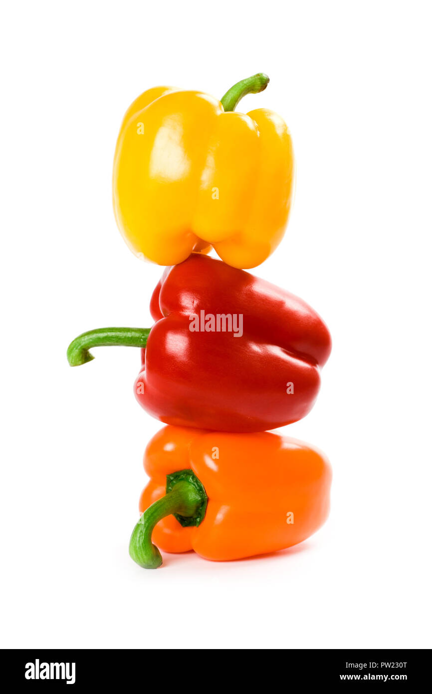stack of three bell peppers isolated on white background Stock Photo ...