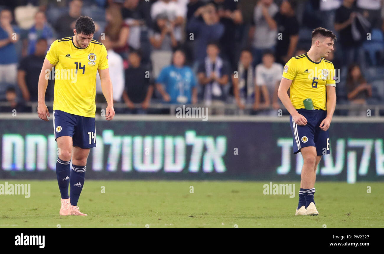 Scotland's Scott McKenna (left) and Kieran Tierney appear dejected ...