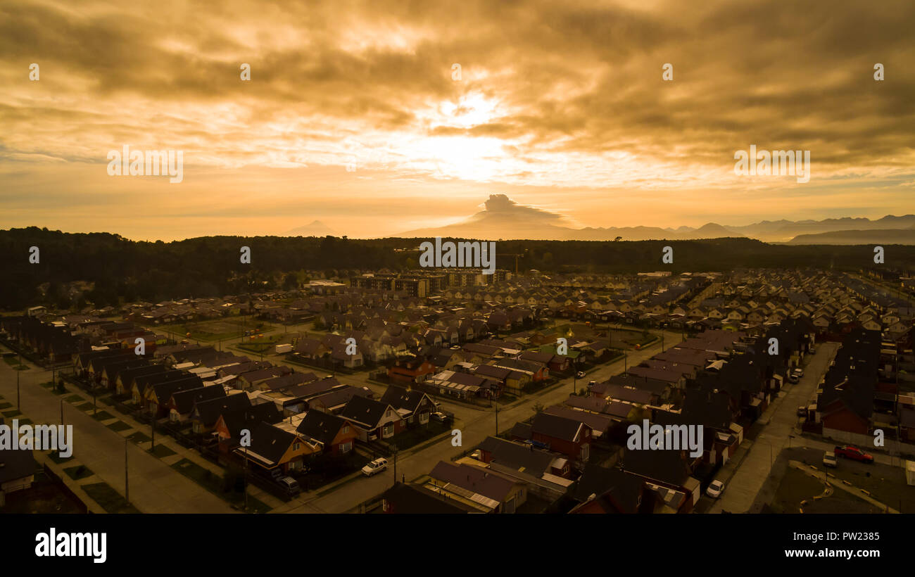 Sunrise overlooking a village in the city of Puerto Montt, where in the ...