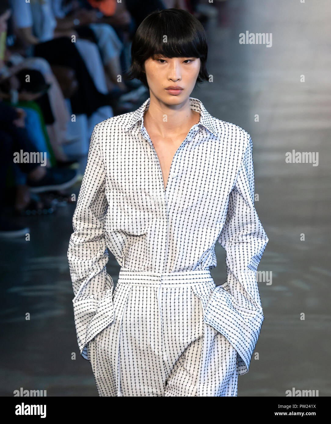 NEW YORK, NY - September 06, 2018: He Jing walks the runway at the Noon ...