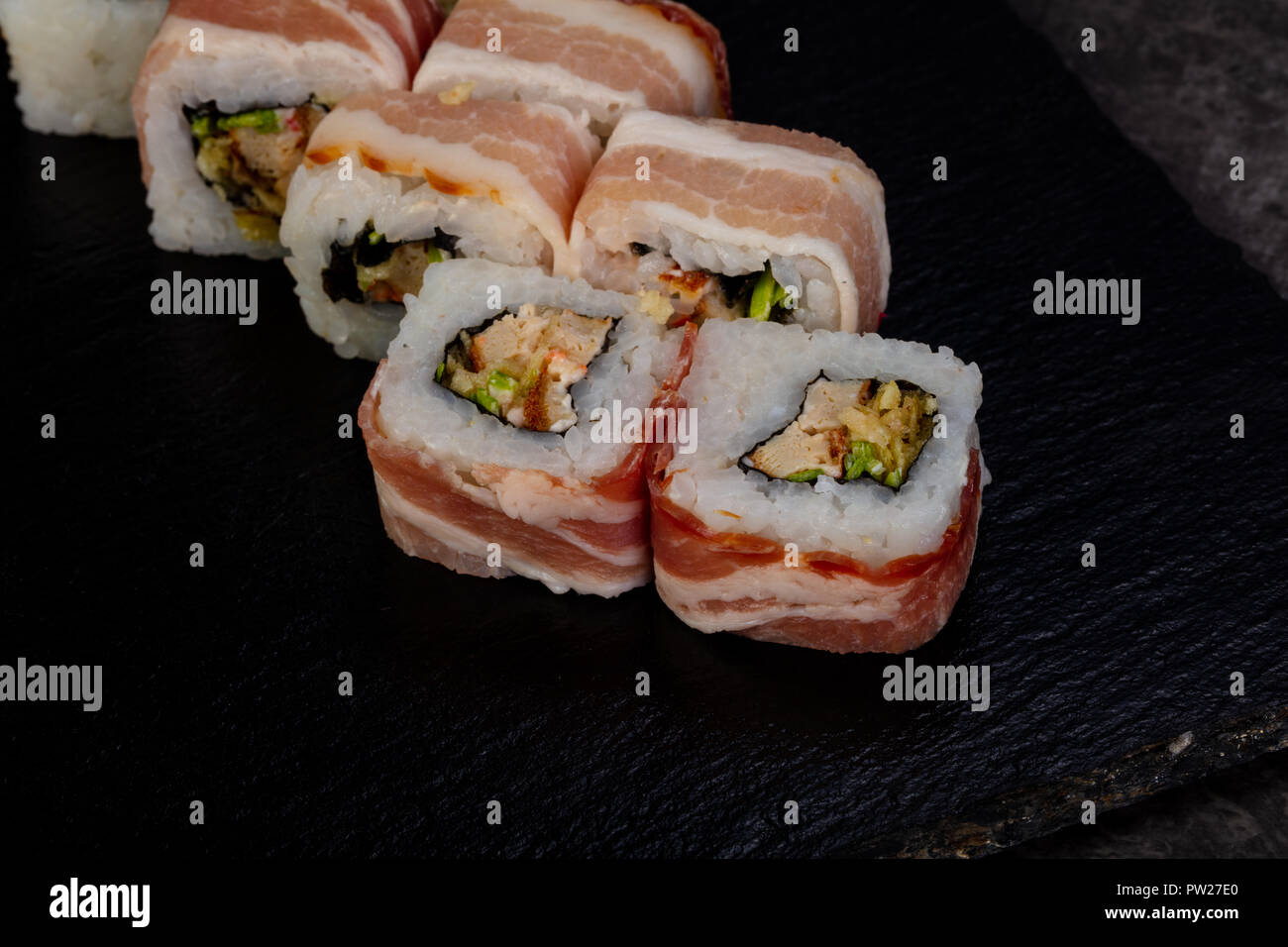 Japanese roll with bacon and cheese Stock Photo - Alamy