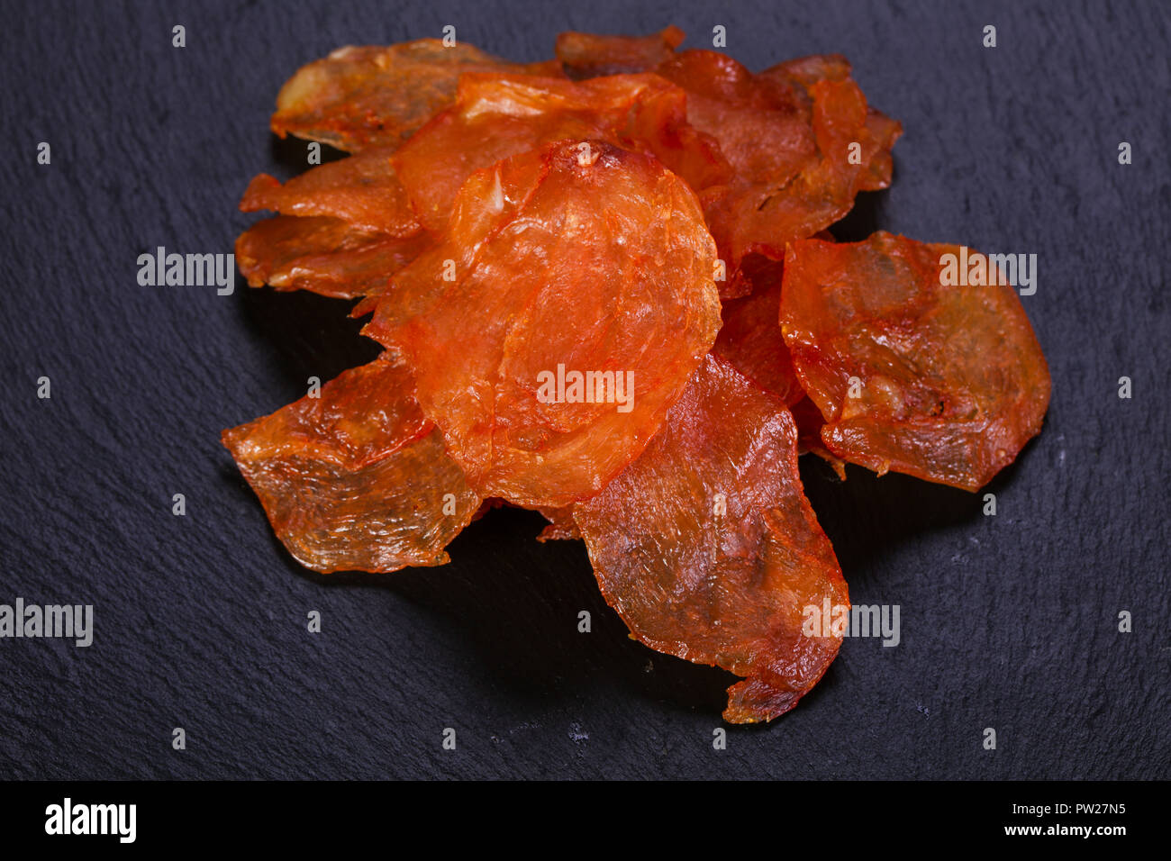 Dry chicken meat over wooden Stock Photo - Alamy