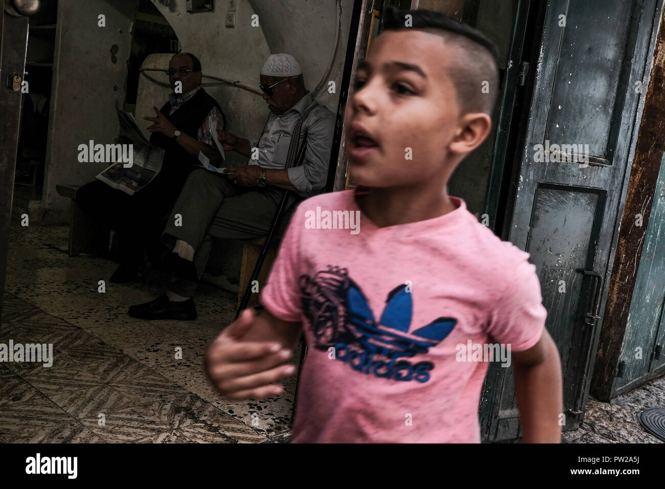 Muslim boy running hi-res stock photography and images - Alamy