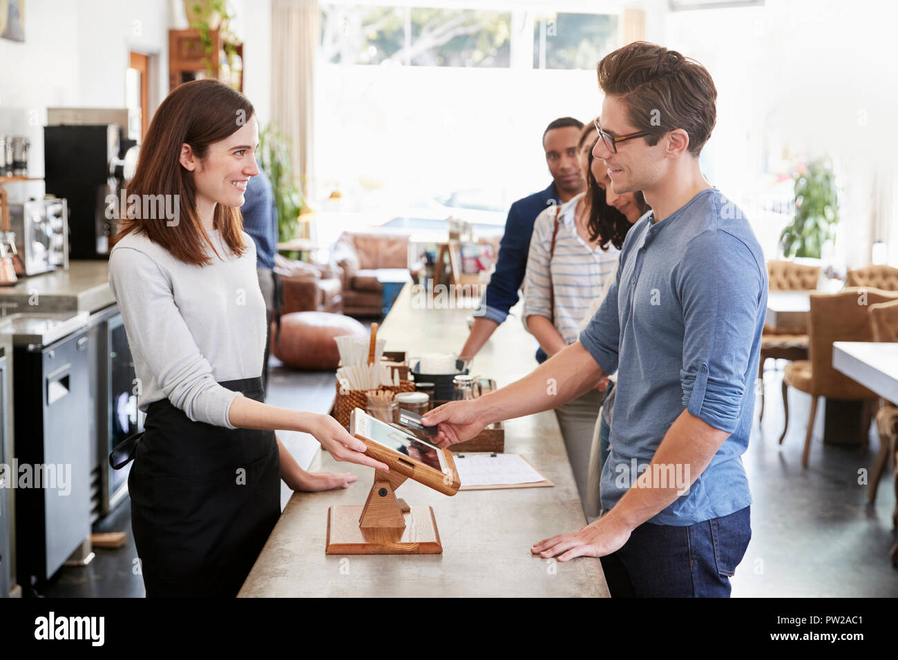 Coffee Shop Queue Stock Photos & Coffee Shop Queue Stock Images - Alamy