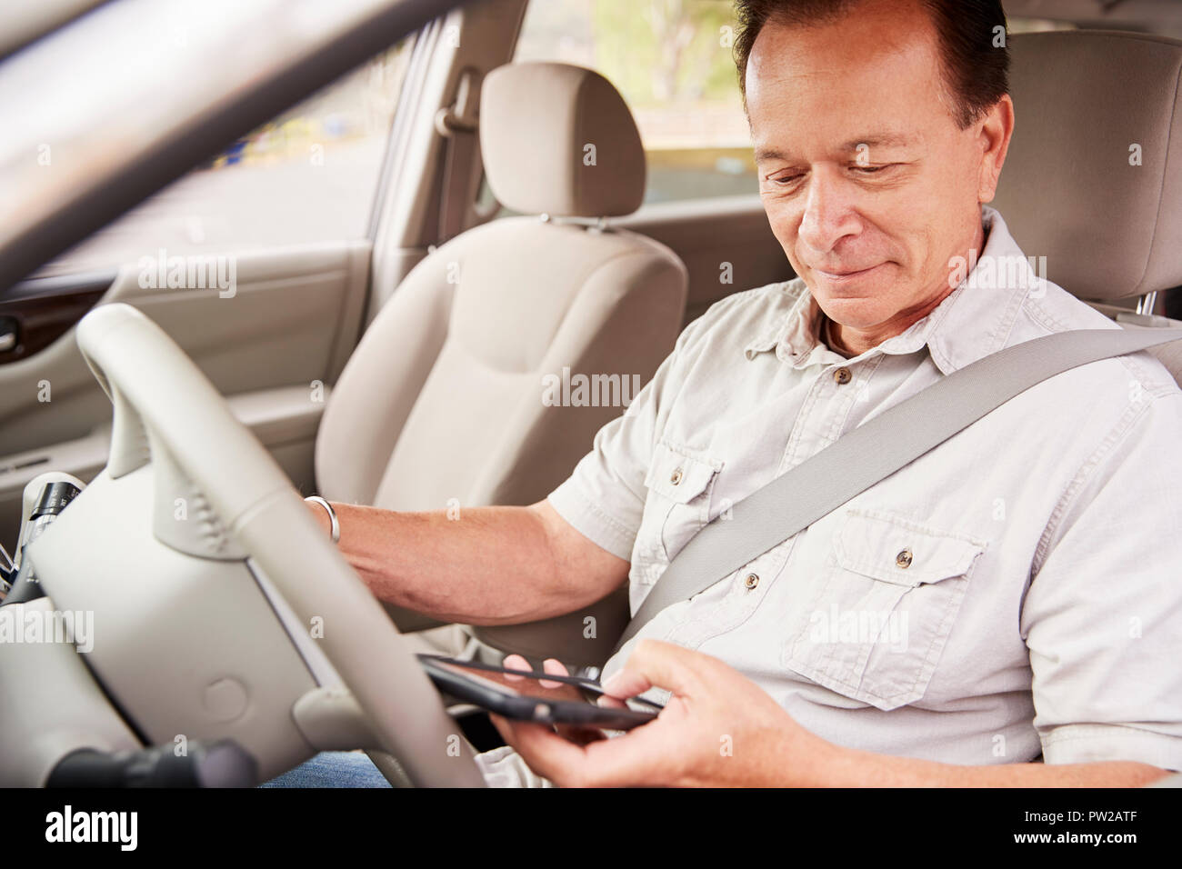 Senior man driving car interior hi-res stock photography and images - Alamy