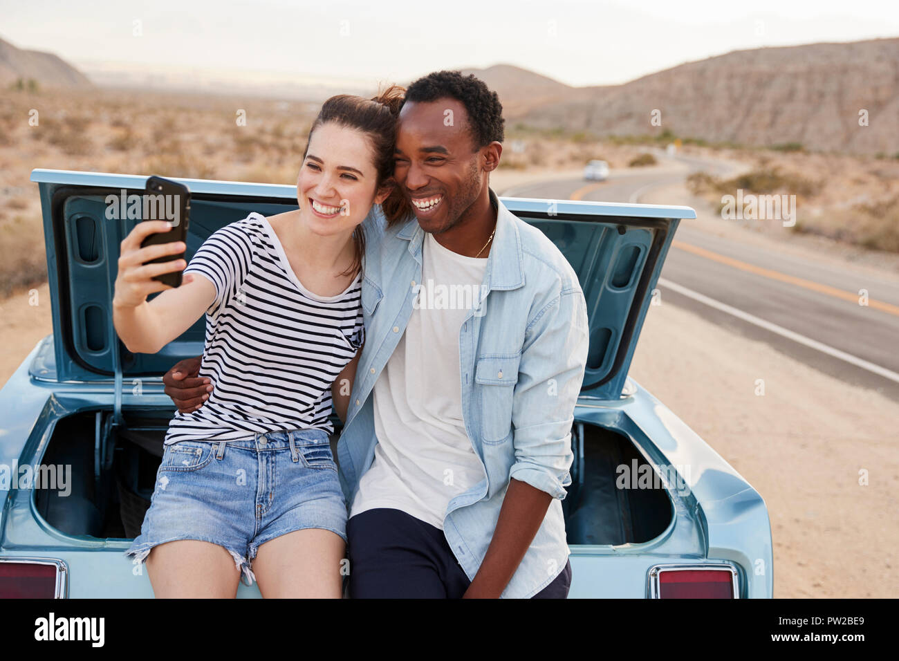 Woman posing in classic car hi-res stock photography and images - Alamy