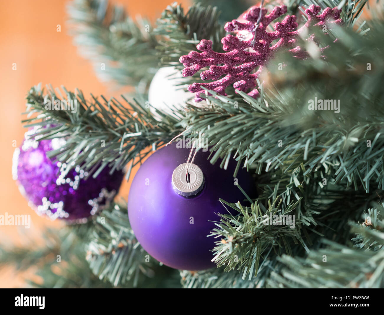 Shiny ornaments on Christmas tree top view Stock Photo - Alamy