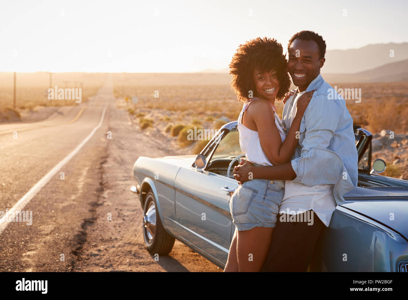 Portrait Of Romantic Couple Enjoying Road Trip In Classic Car Stock ...