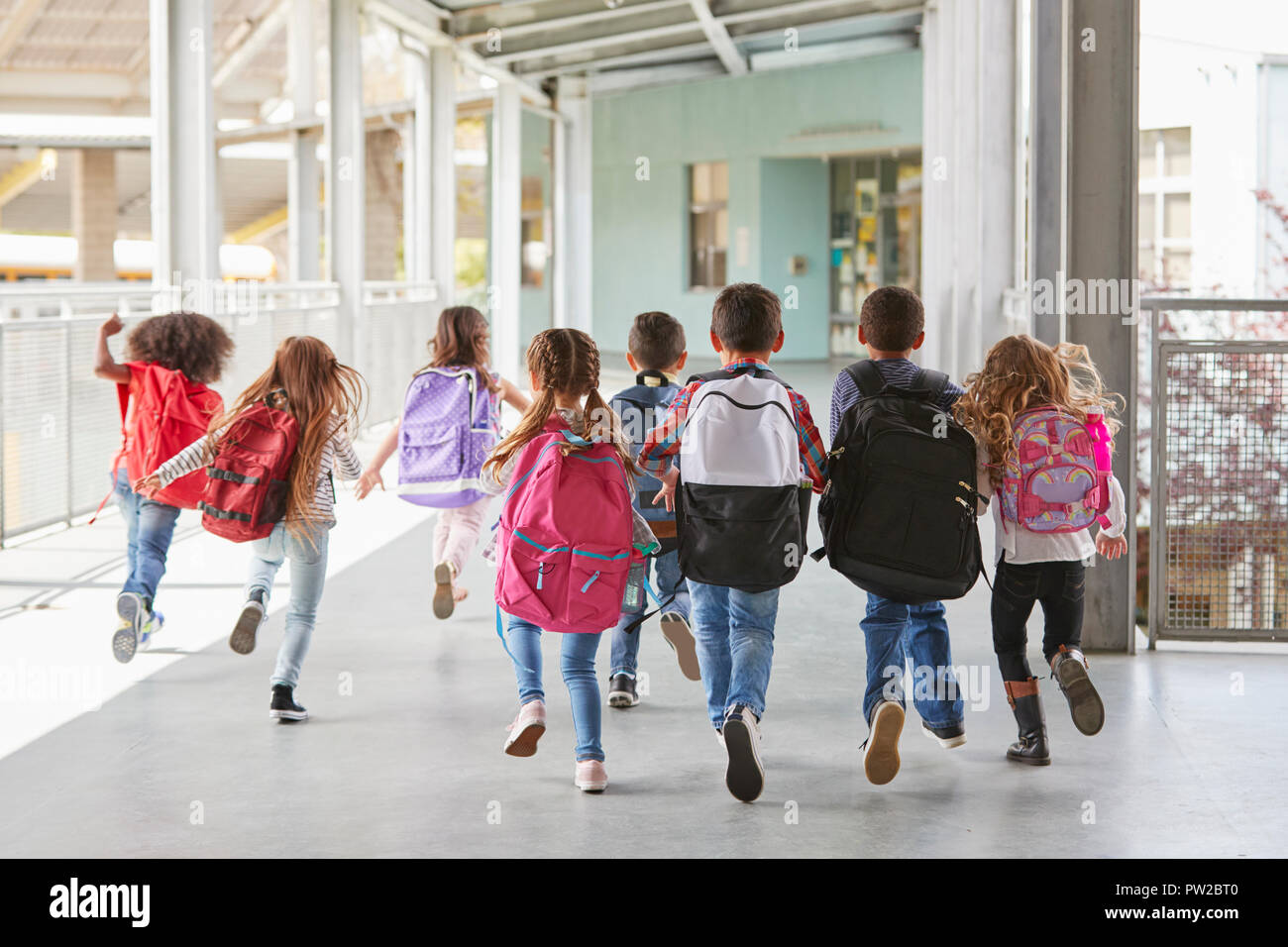 Kids run out of school hi-res stock photography and images - Alamy
