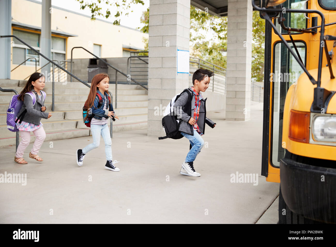 Schoolgirls walking in row hi-res stock photography and images - Alamy