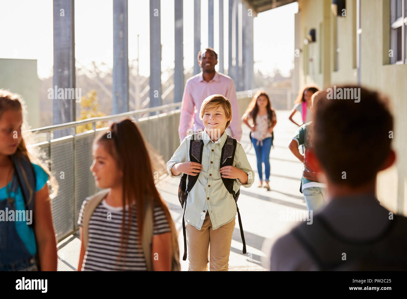 Happy schoolgirls walking hi-res stock photography and images - Alamy