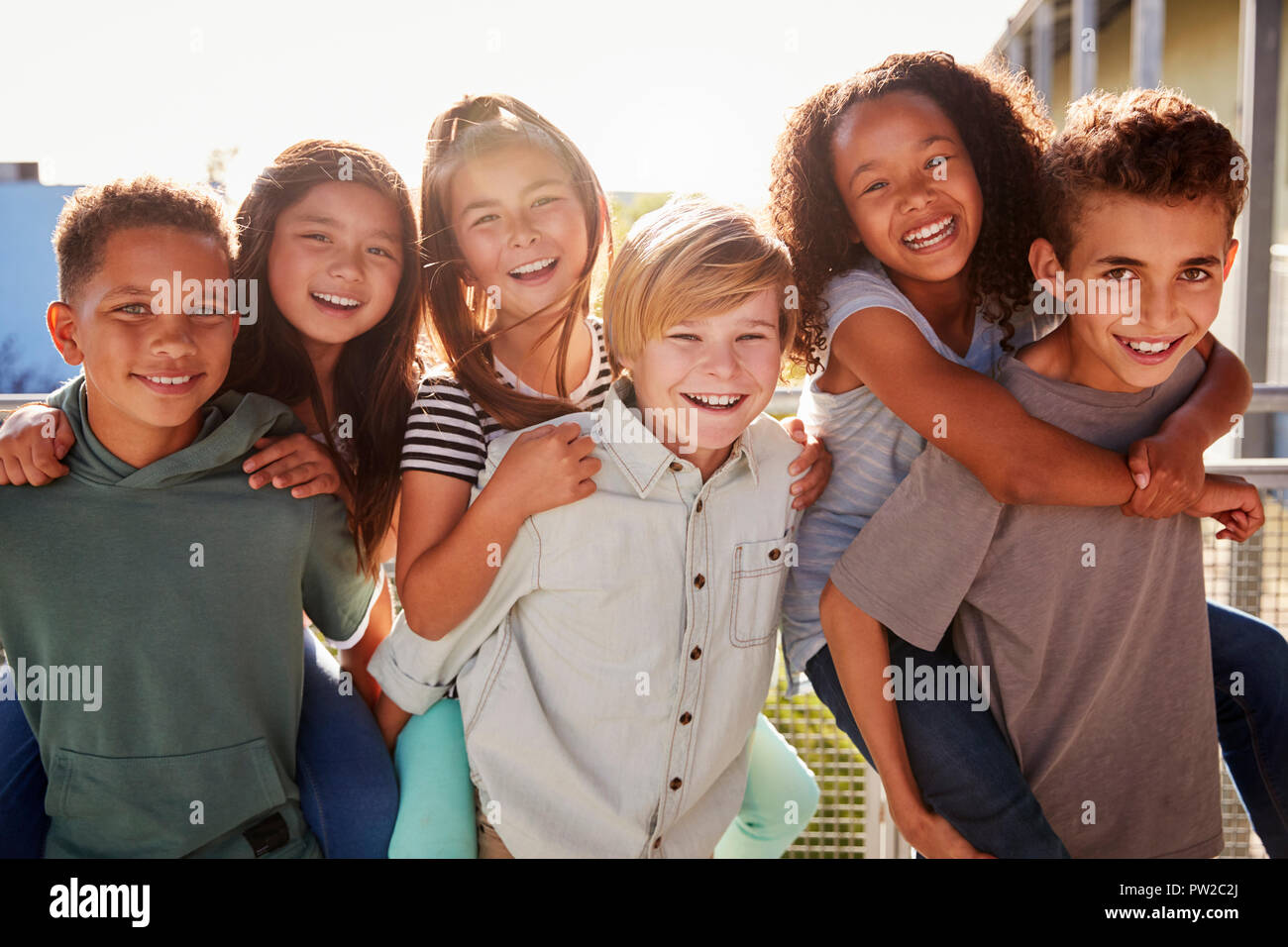 Elementary school kids smiling to camera at break time Stock Photo - Alamy