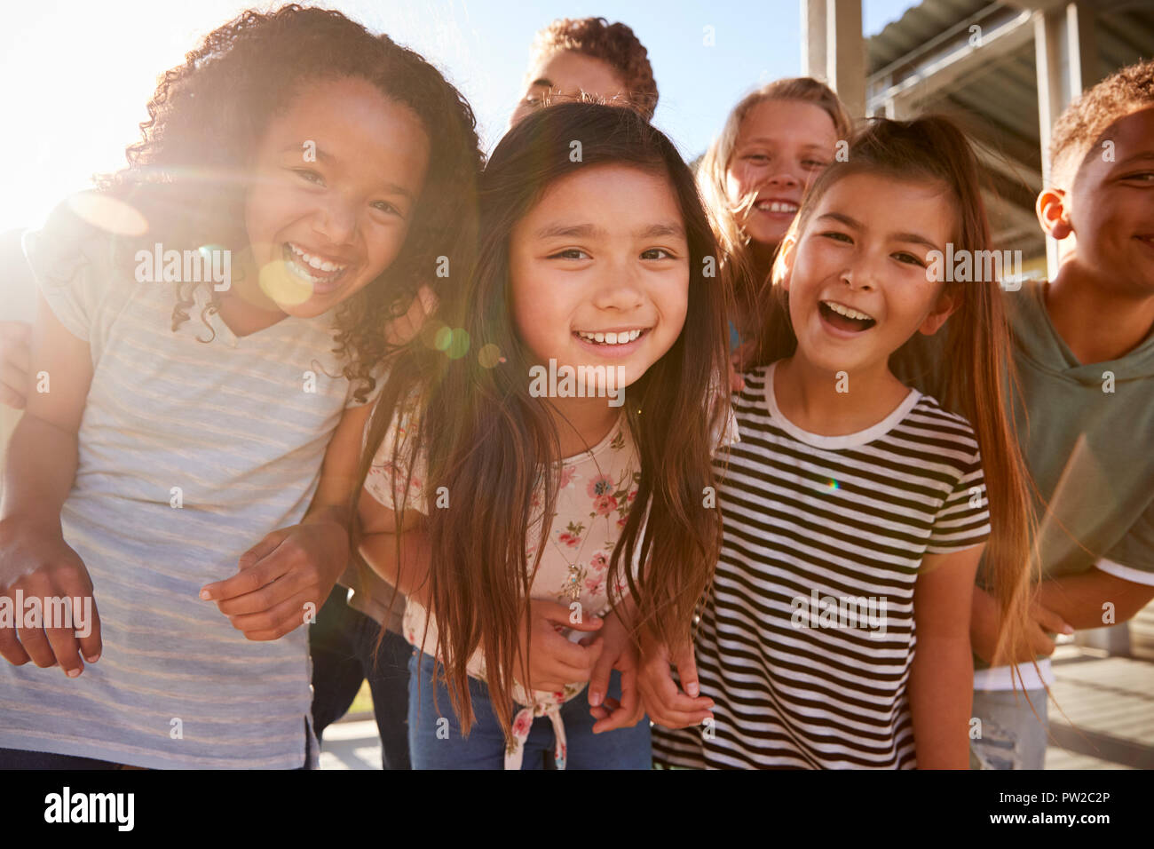 Elementary school kids smiling to camera at break time Stock Photo - Alamy