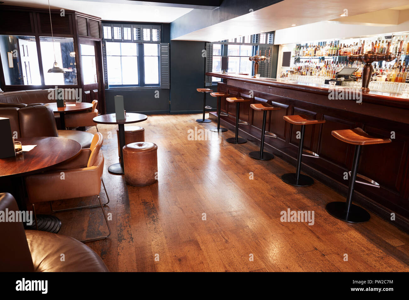 Interior Of Empty Bar With Stools And Counter Stock Photo - Alamy