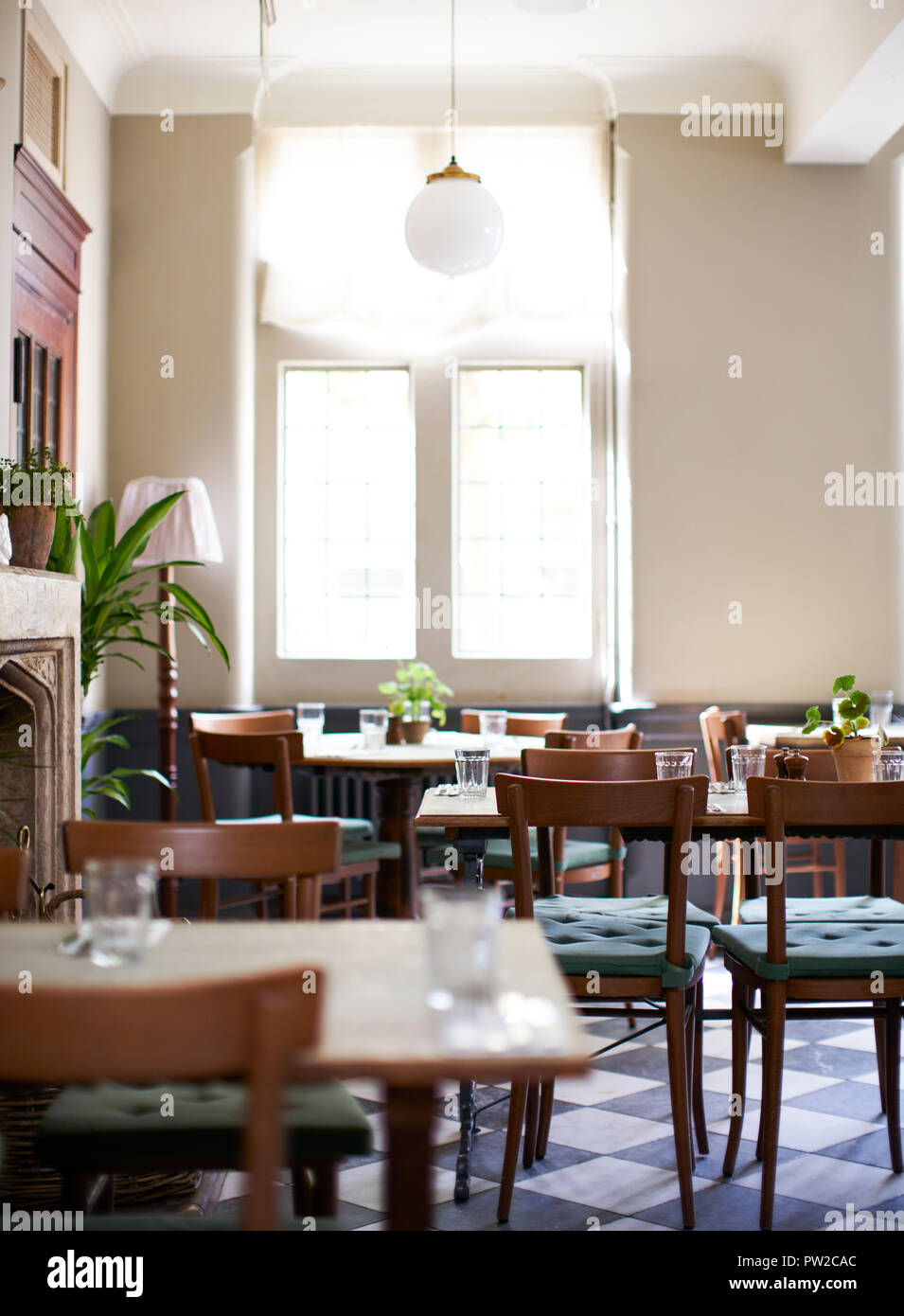 Tables Laid For Service In Empty Restaurant Stock Photo - Alamy