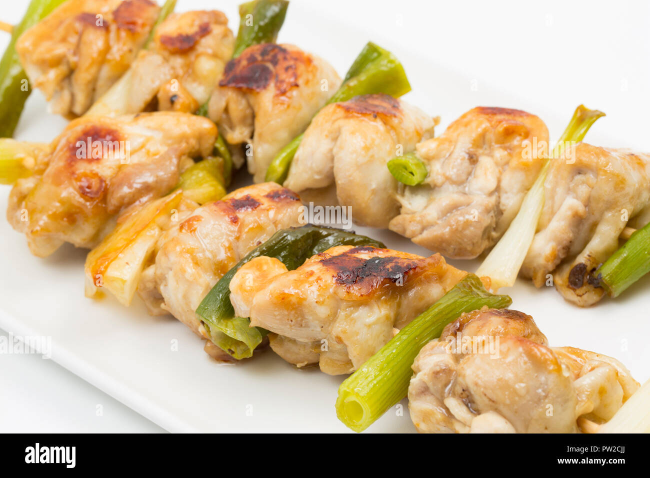 Home cooked Japanese style chicken Yakitori consisting of spring onions ...