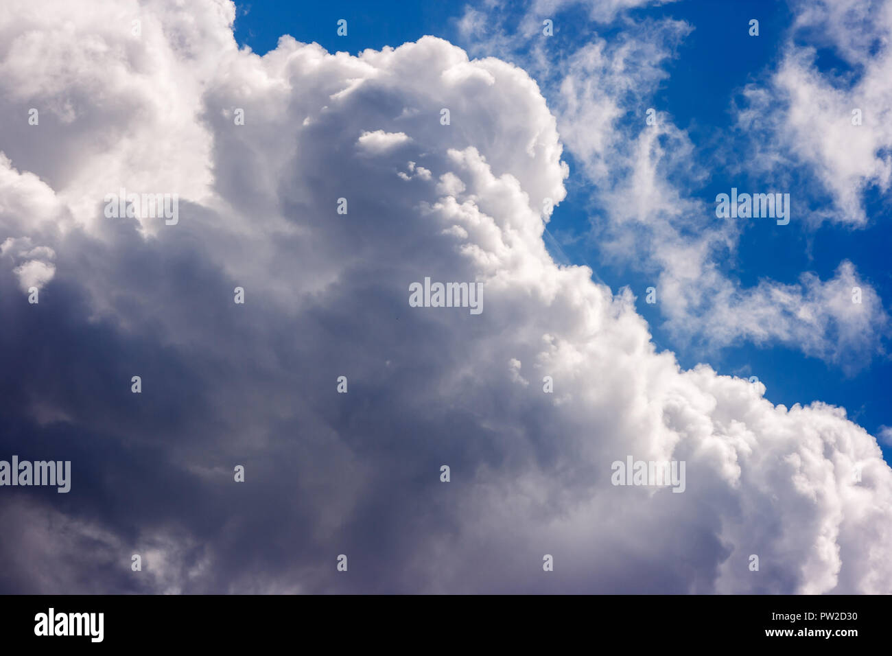 dense and great white clouds were formed on a beautiful summer blue sky ...