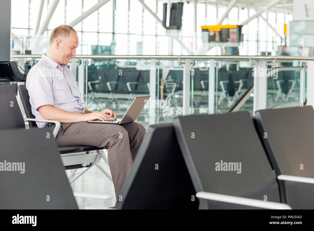 Working on an airplane hi-res stock photography and images - Alamy