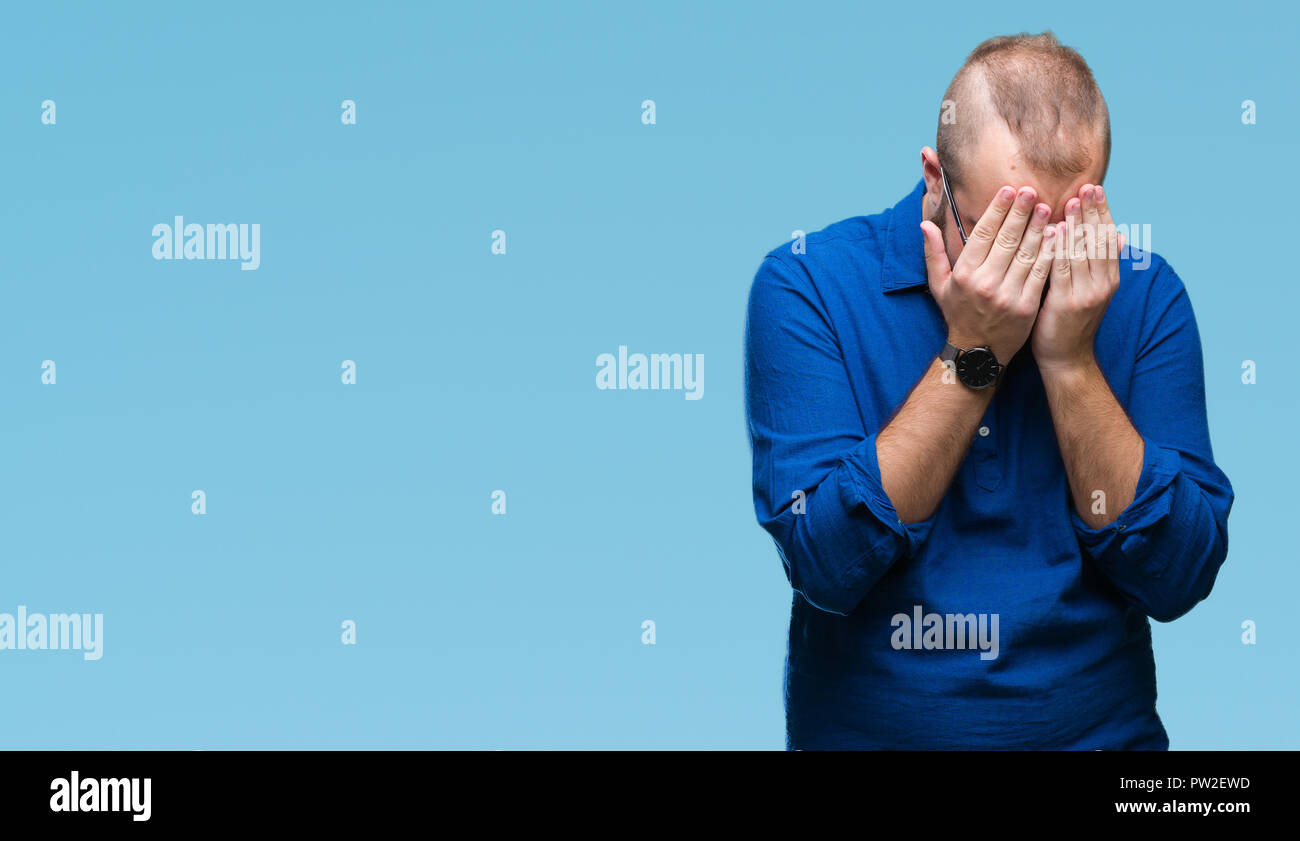 Young caucasian hipster man wearing glasses over isolated background ...