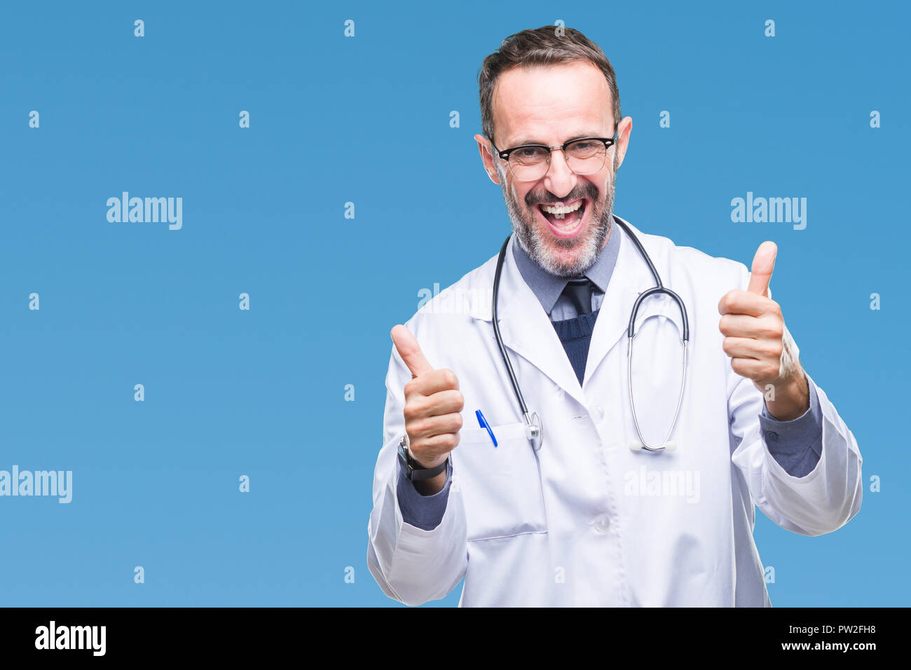 Middle age senior hoary doctor man wearing medical uniform isolated ...