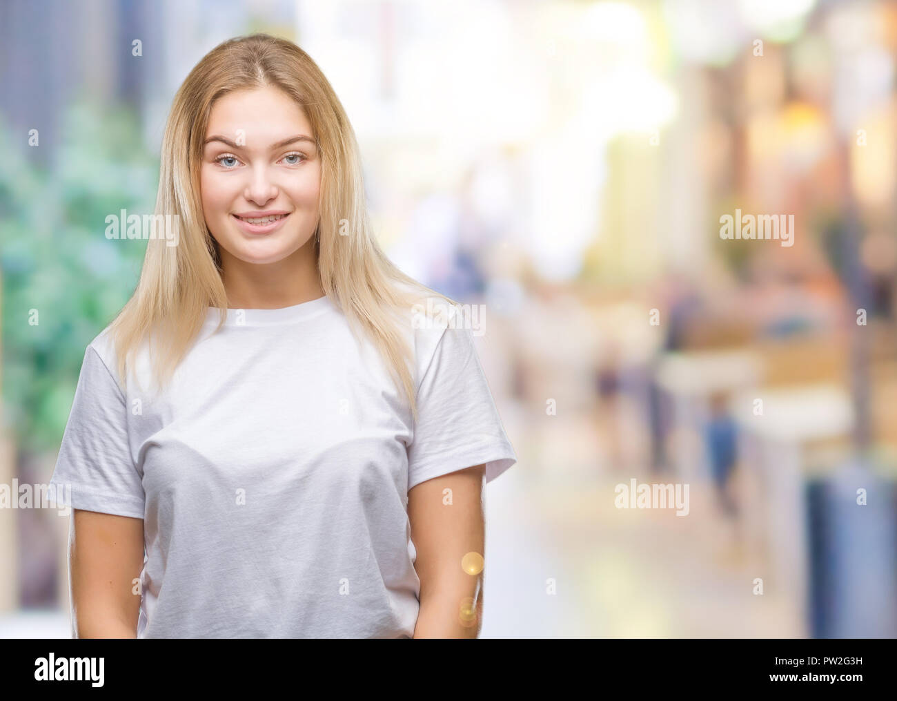 Young caucasian woman over isolated background with a happy and cool ...
