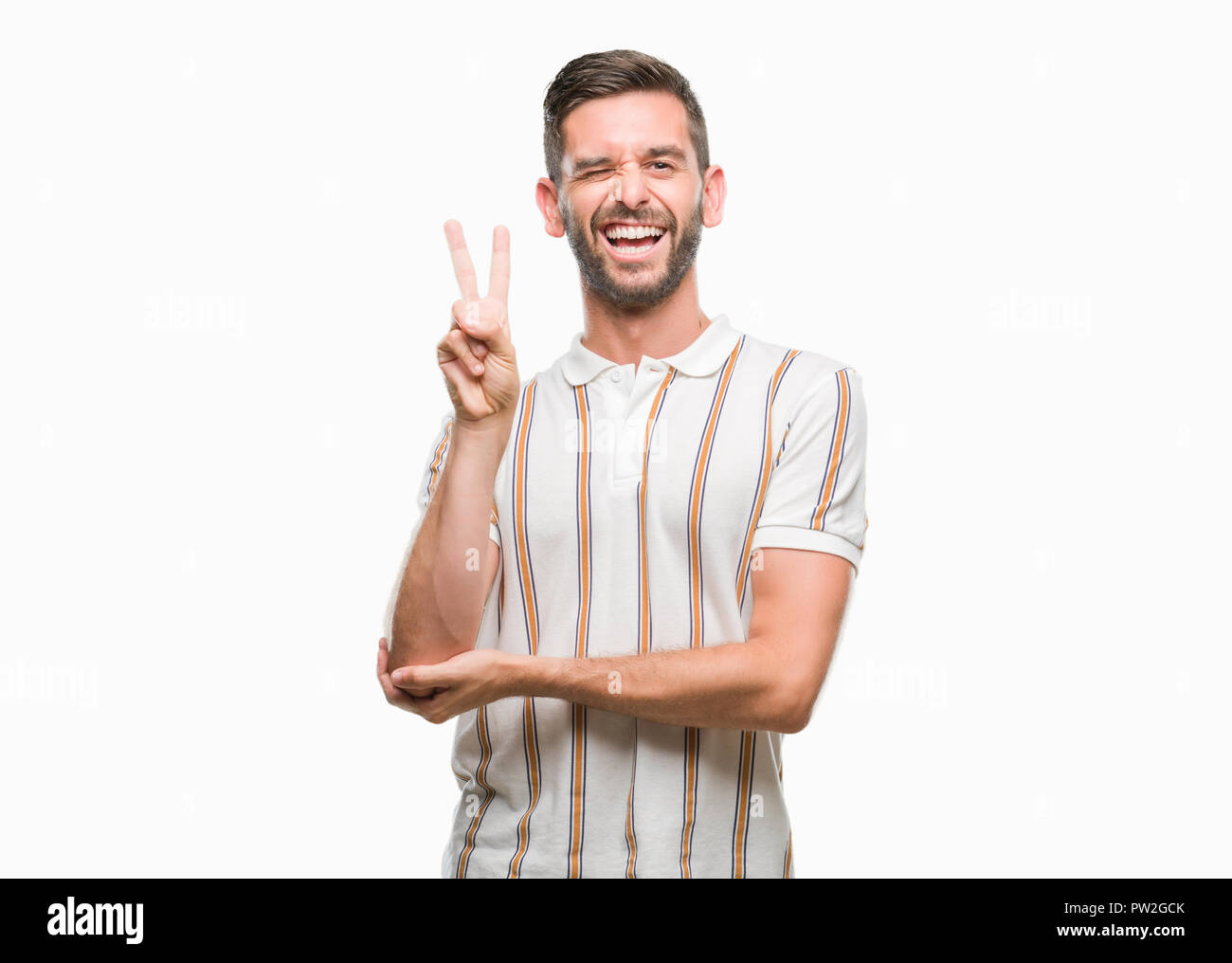 Young handsome man over isolated background smiling with happy face ...