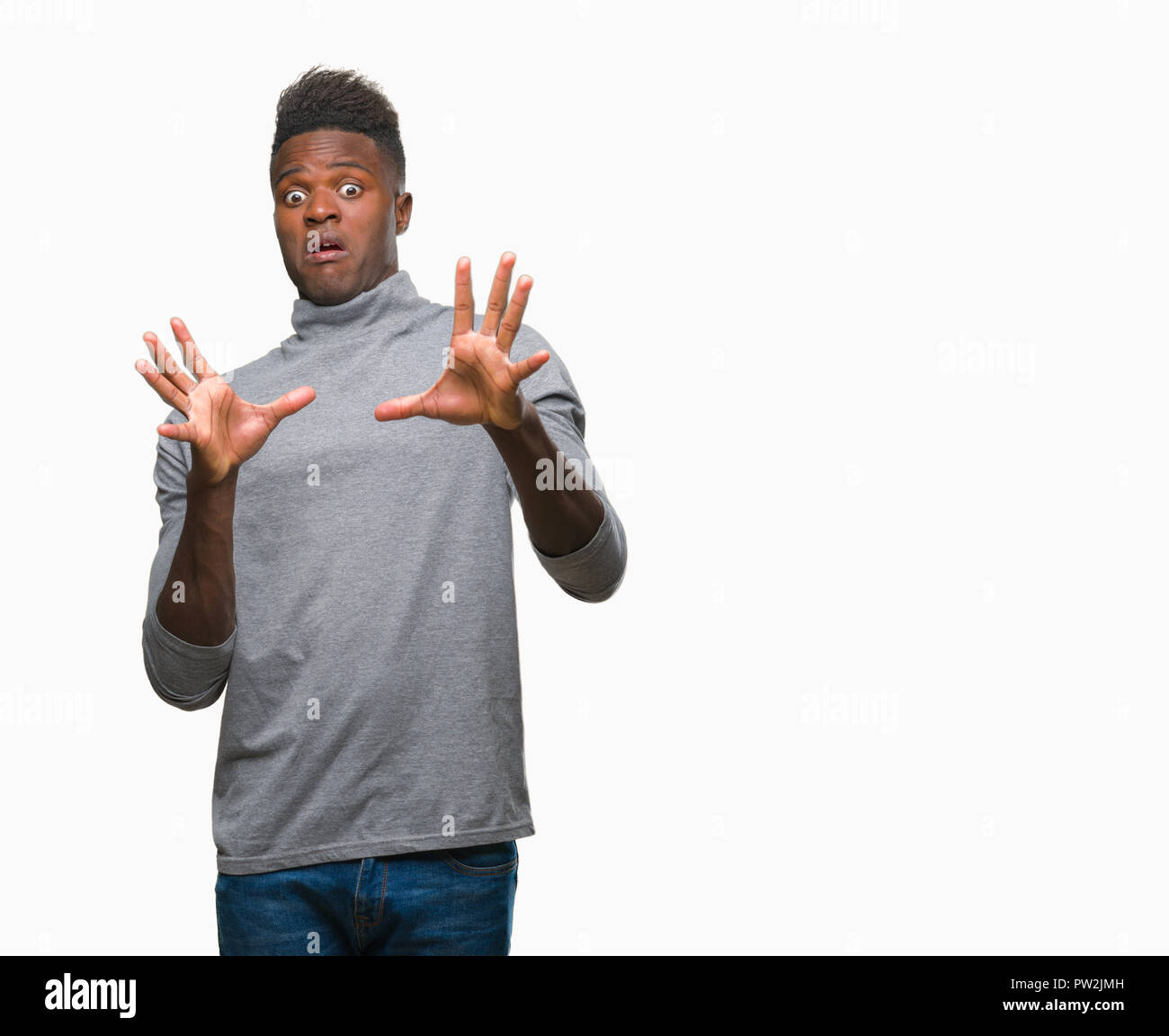 Young african american man over isolated background afraid and ...