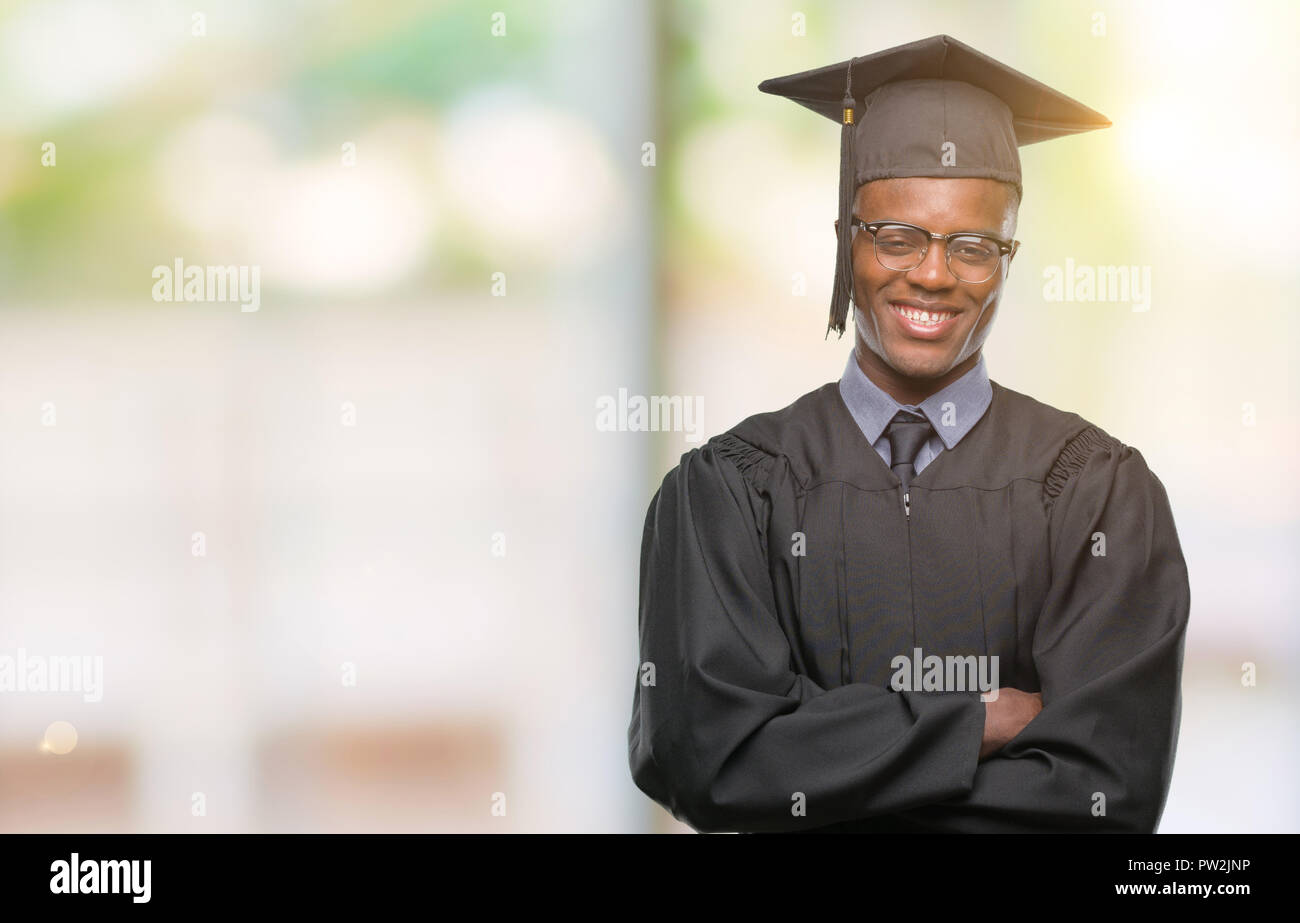 Young graduated african american man over isolated background happy ...