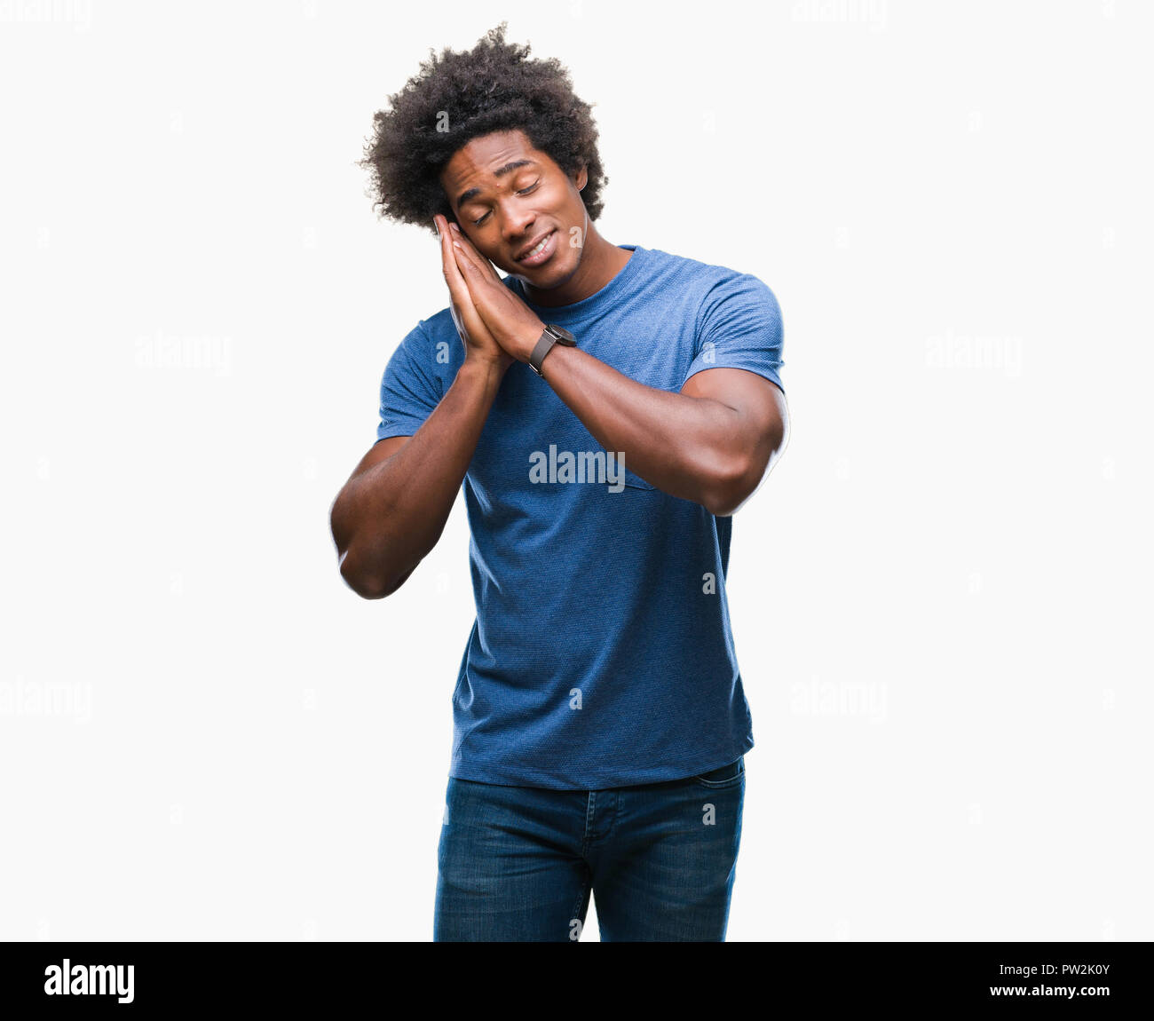Afro american man over isolated background sleeping tired dreaming and ...