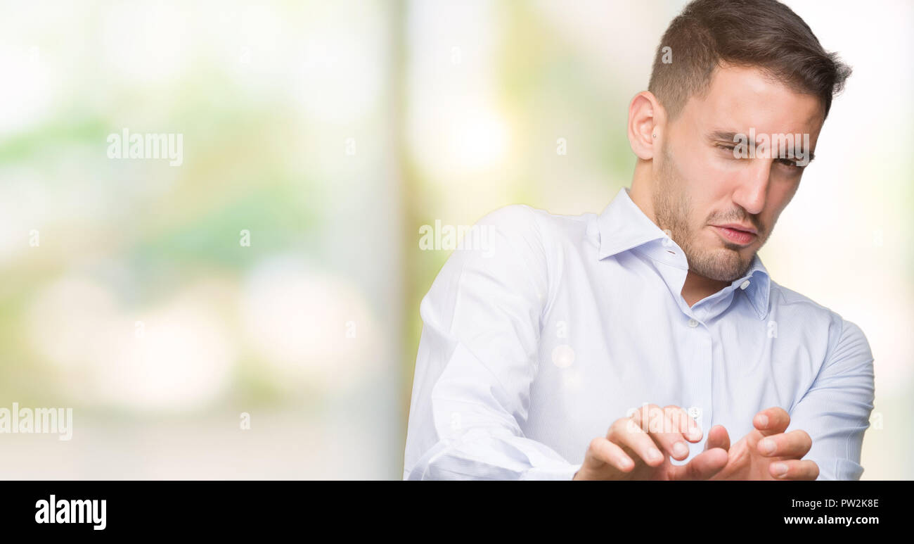 Handsome young businessman disgusted expression, displeased and fearful ...