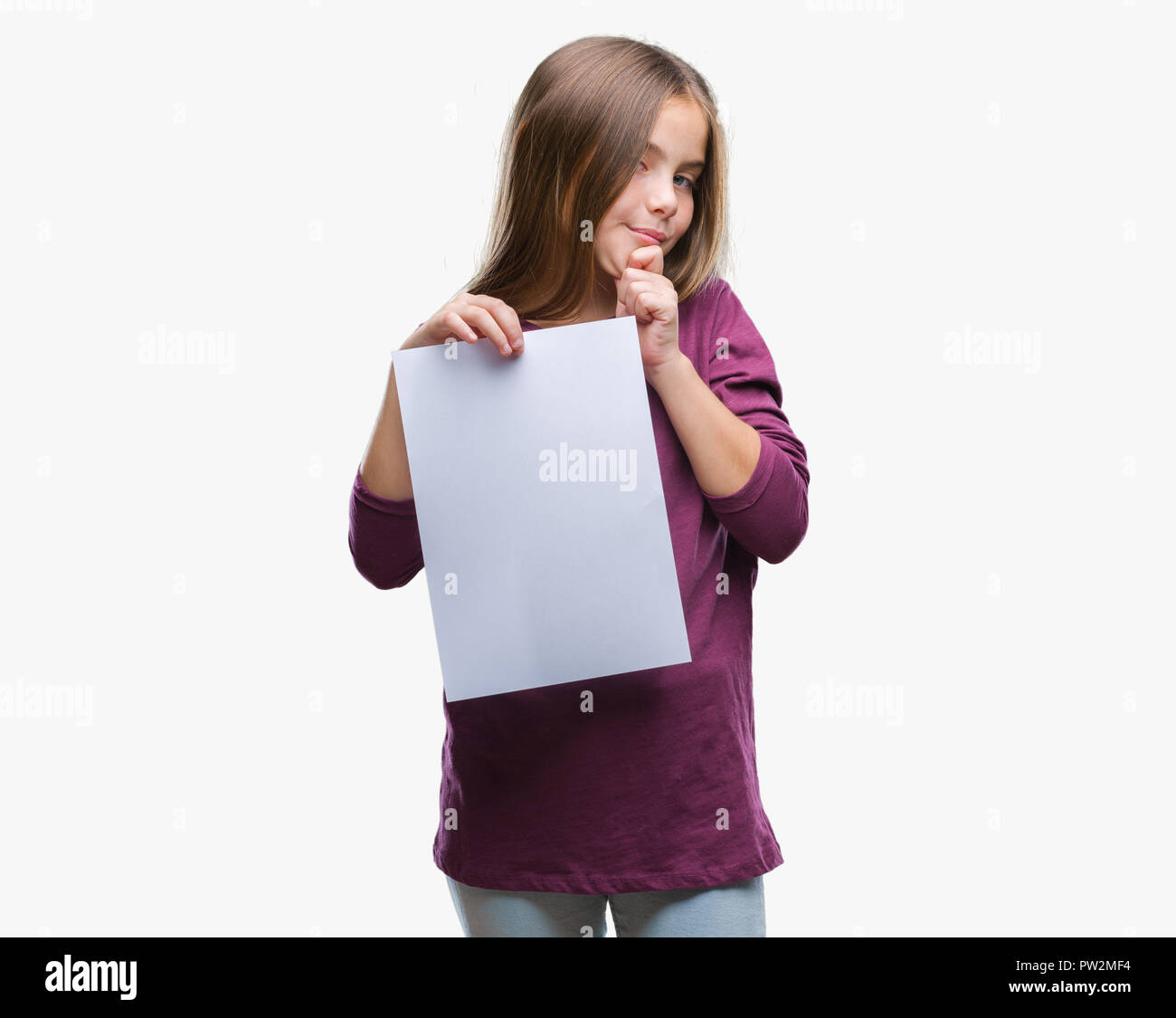 Young beautiful girl holding blank sheet paper over isolated background ...